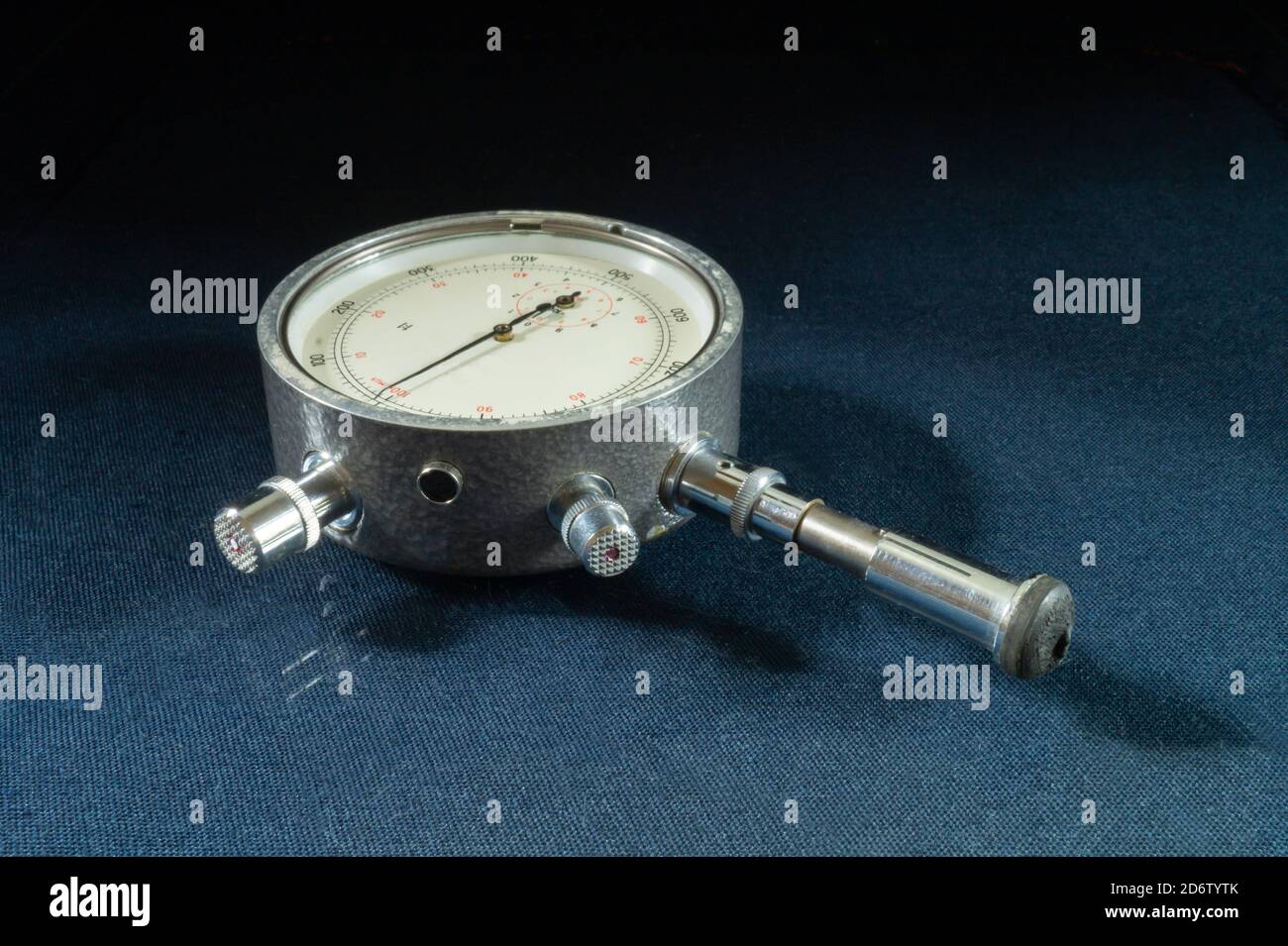 The Mechanical tachometer with arrow on black background. Instrument ...