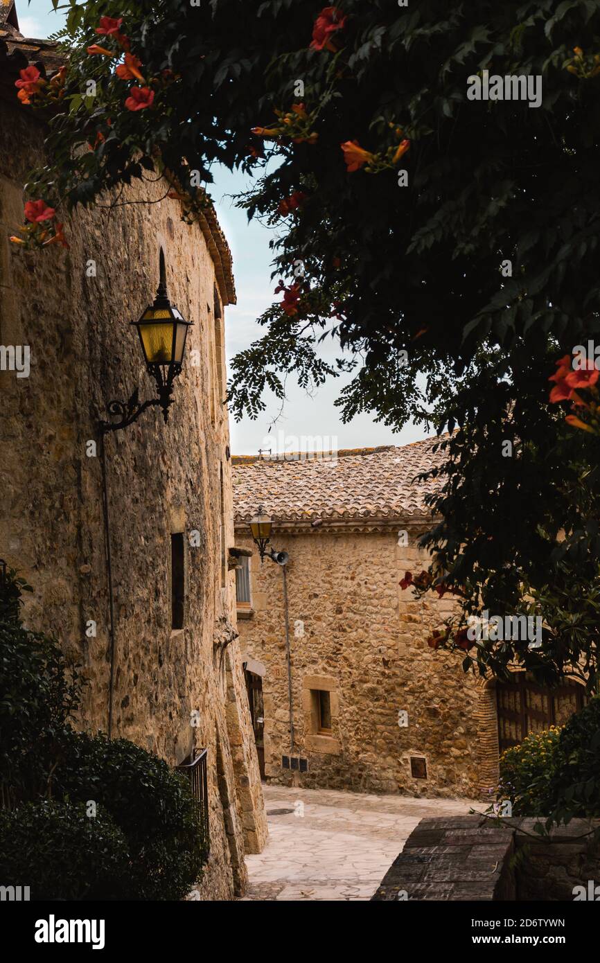 Vertical shot of old houses captured in Pals, Spain Stock Photo - Alamy