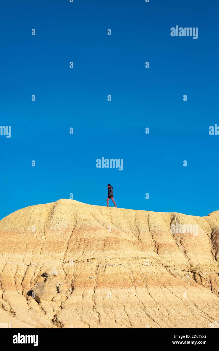 Woman in desertic landscape hi-res stock photography and images - Alamy