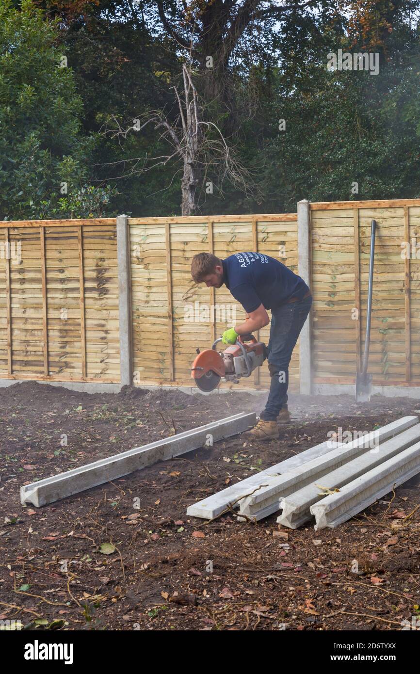 Men cutting fence posts hi-res stock photography and images - Alamy