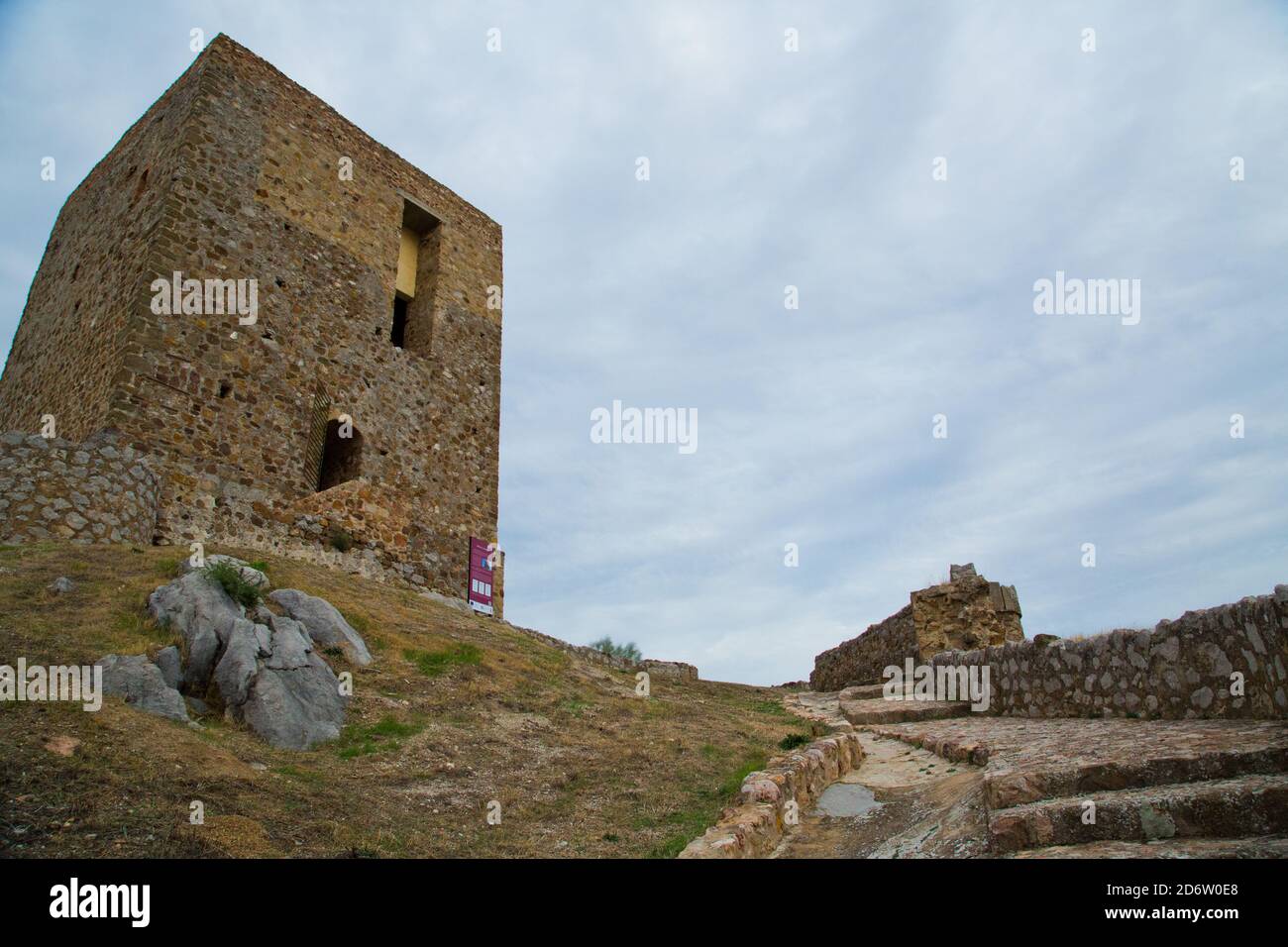 View of access and wall to the large square tower of the castle Stock ...