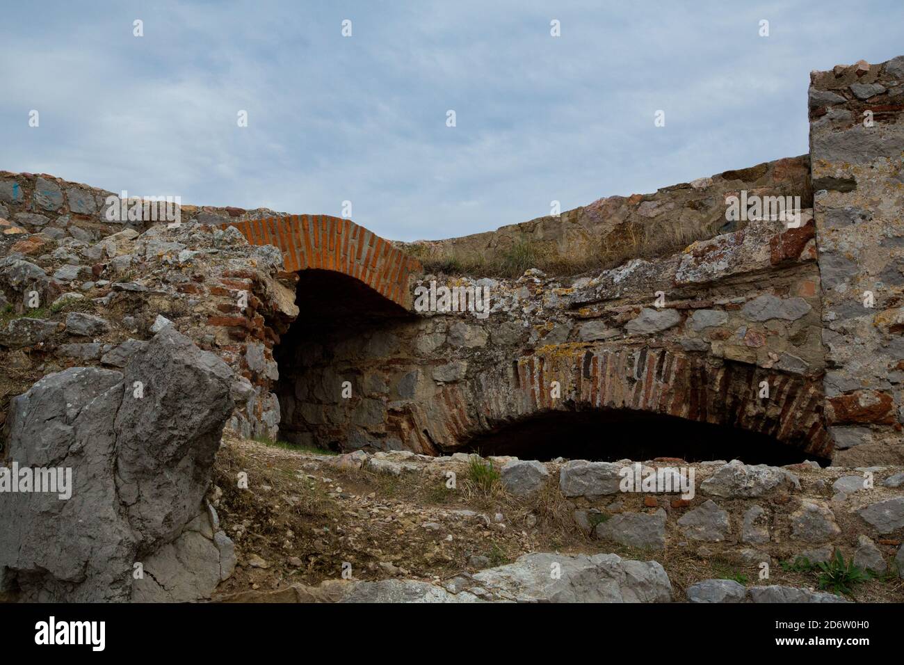 Various red brick arches for access to medieval defensive walls Stock ...
