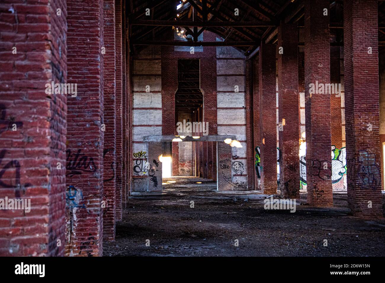 Warehouse interior with large red brick walls Stock Photo - Alamy