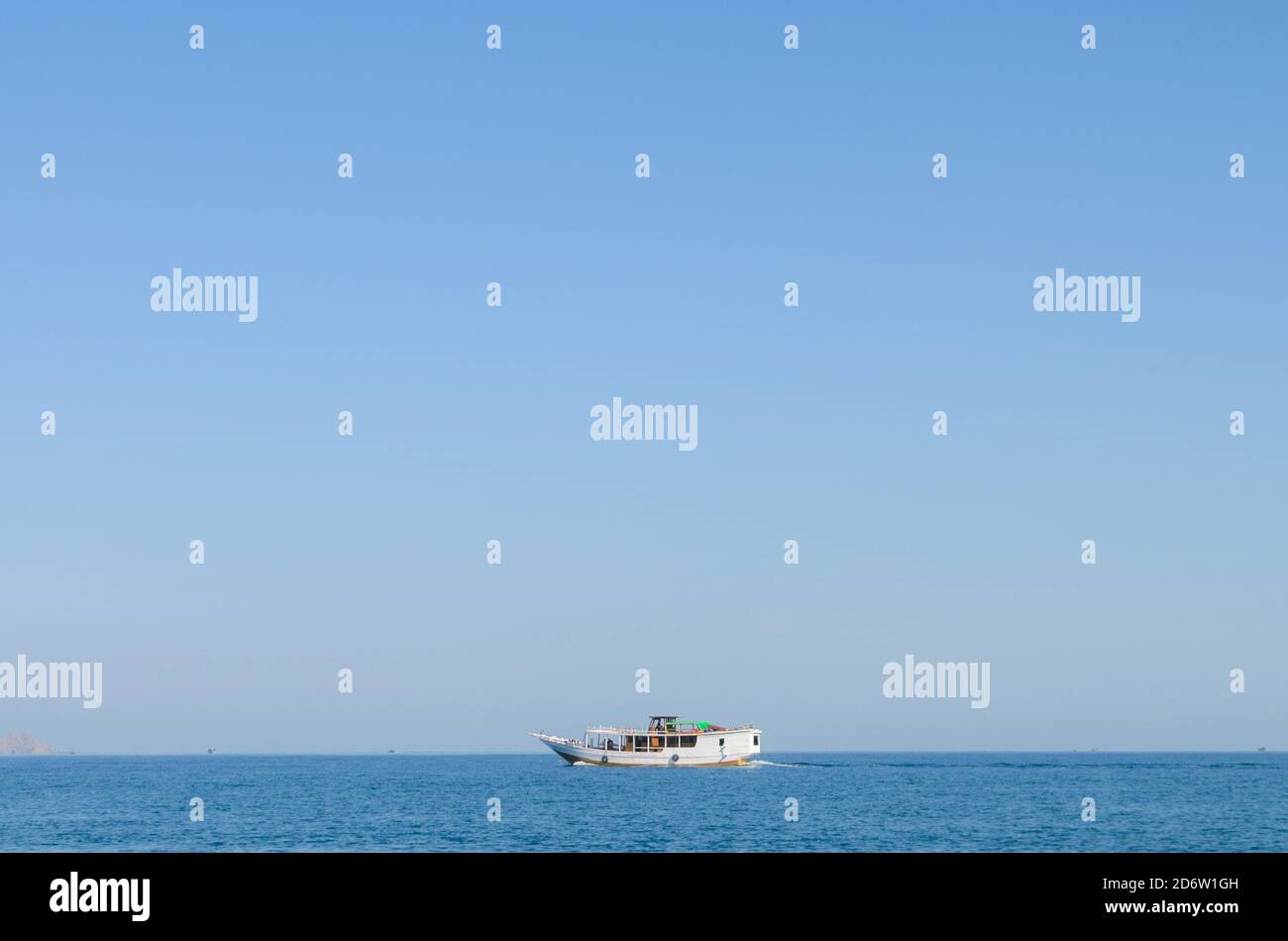 Traditional cruise ship sailing at Komodo National Park, Labuan Bajo ...