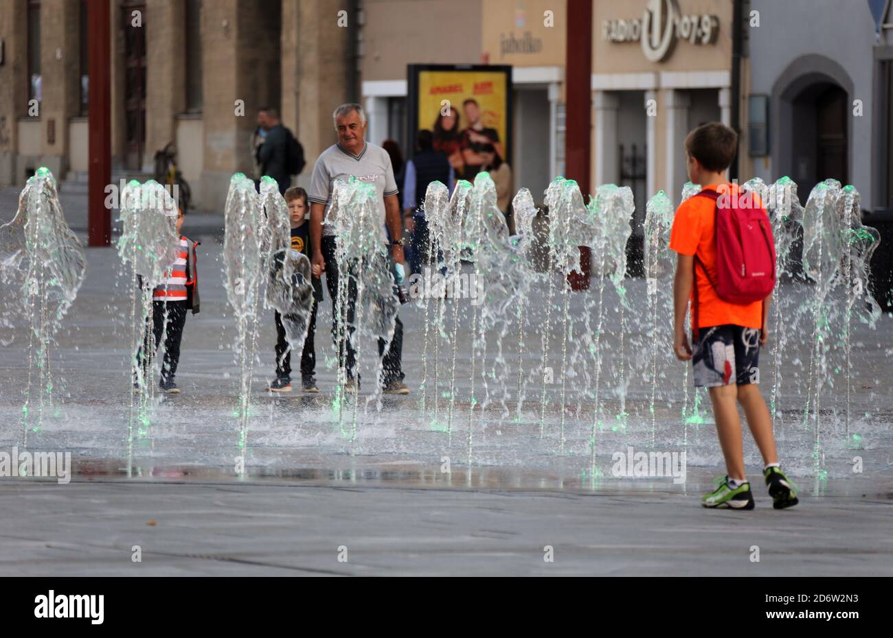 Jumping jets water feature in the Main Square at Maribor in Slovenia ...