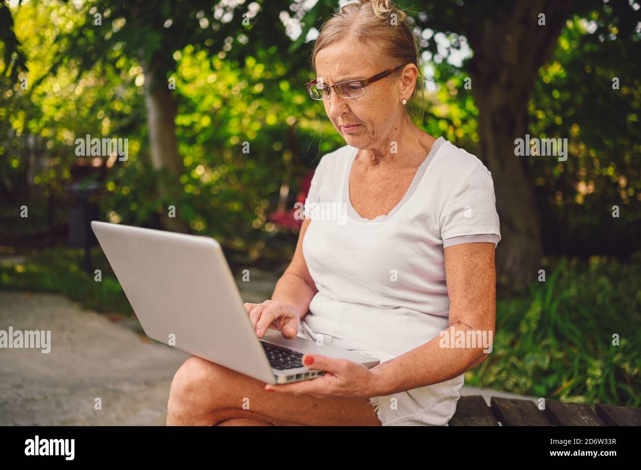 Technology, old age people concept - elderly happy senior old woman ...