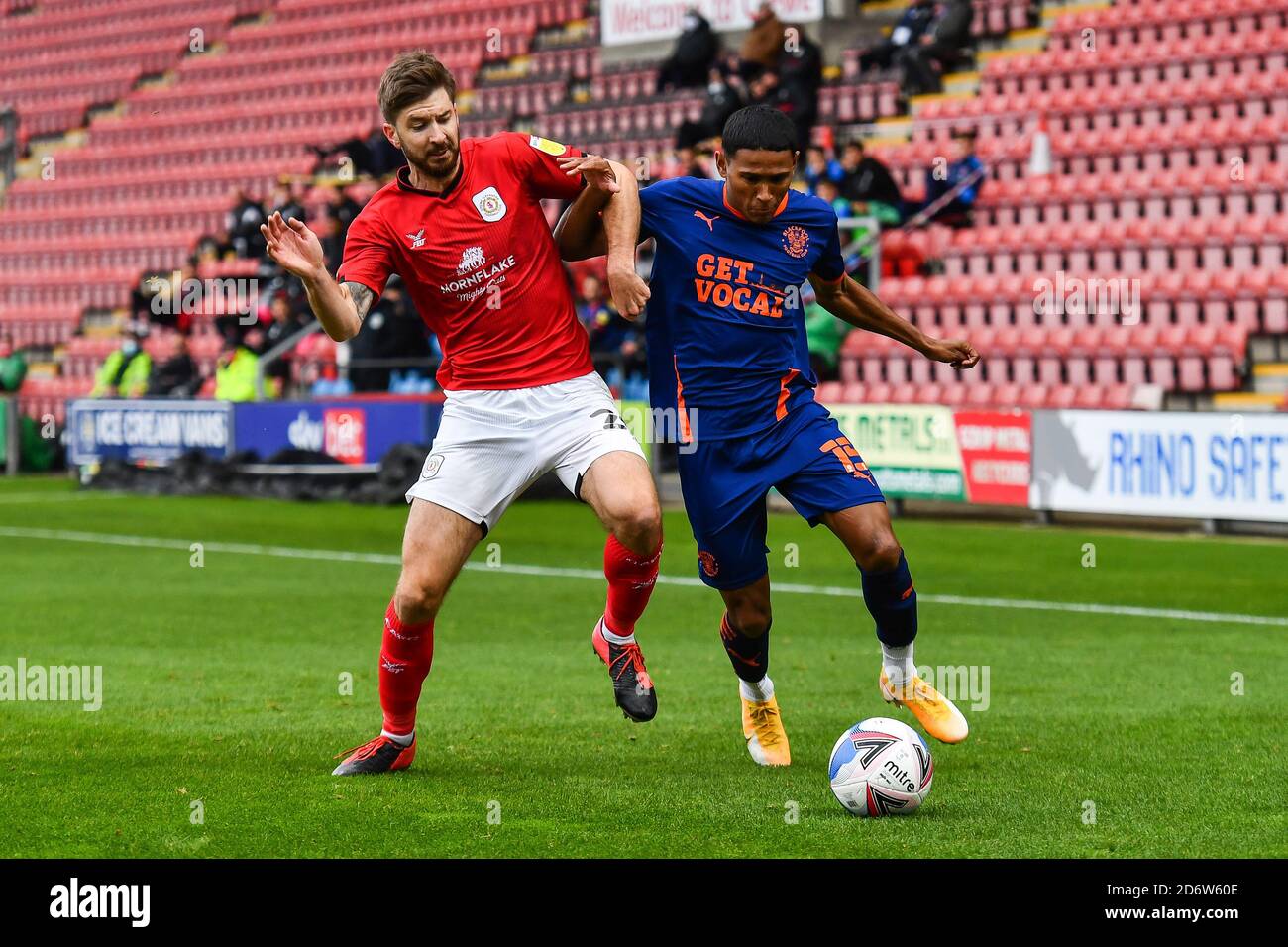Demi Mitchell (15) of Blackpool battles with Luke Murphy (28) of Crewe ...