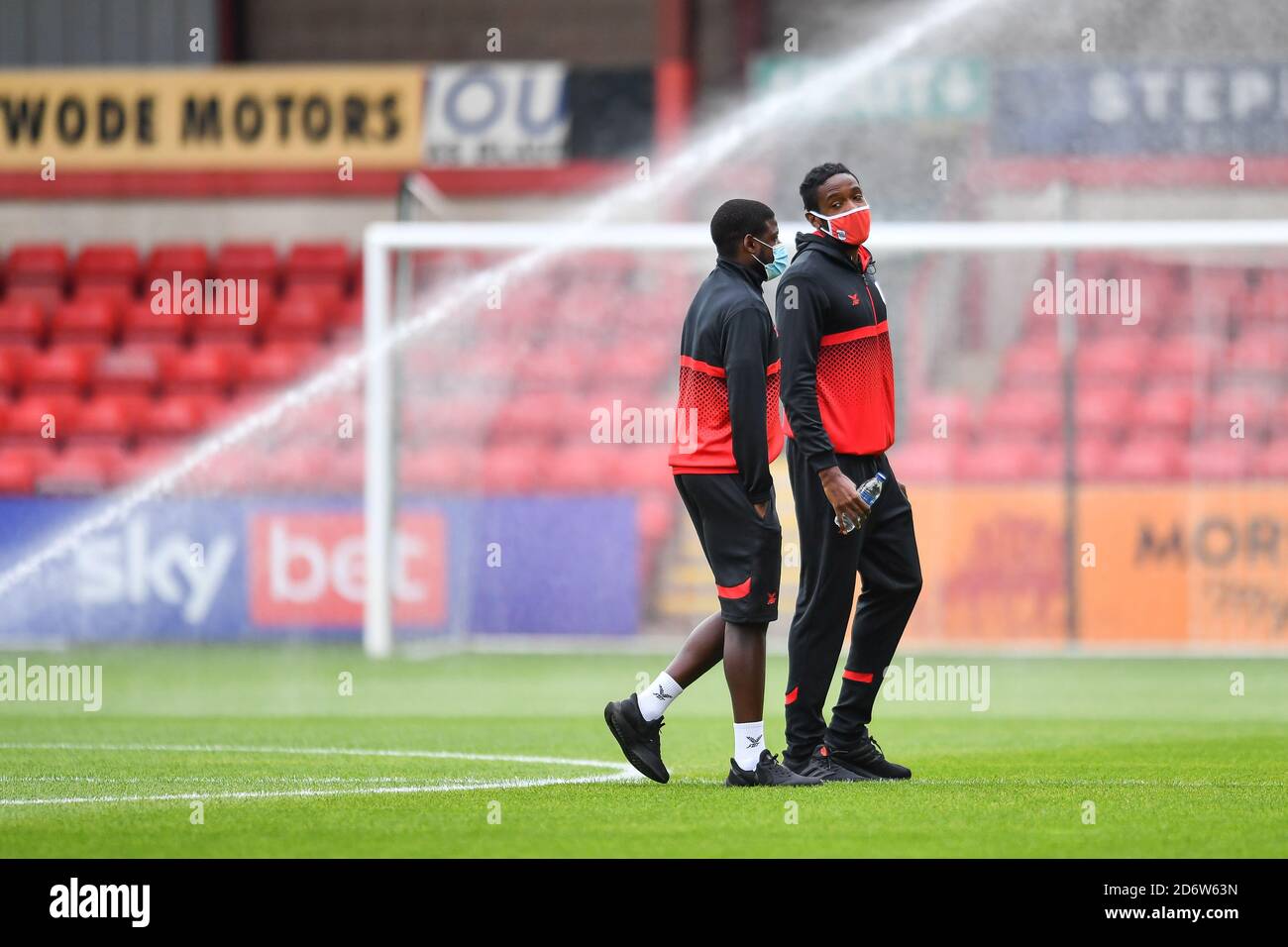 Crewe Alexandra players inspecting the pitch as the springers come on ...