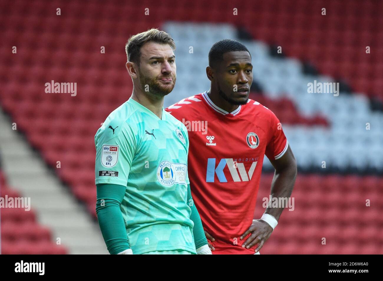 Jamie Jones (1) of Wigan Athletic O Bogle (17) of Charlton Athletic ...