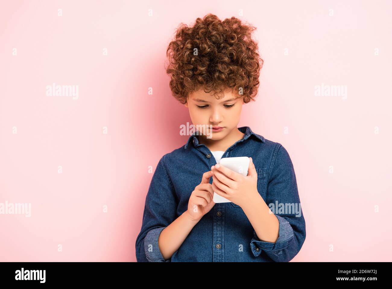 Child boy using smartphone device hi-res stock photography and images ...