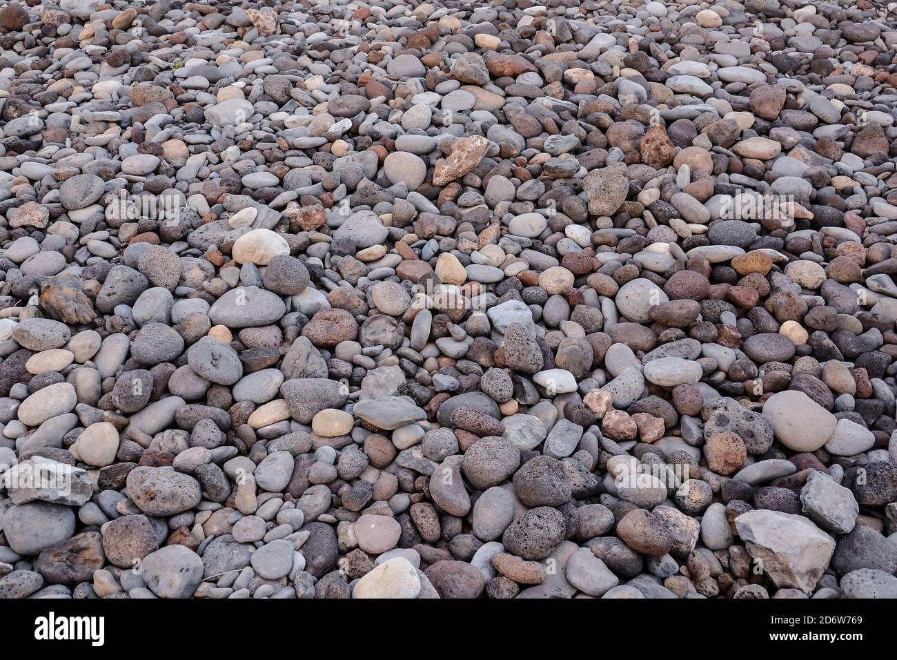 Dry round reeble stones Stock Photo - Alamy