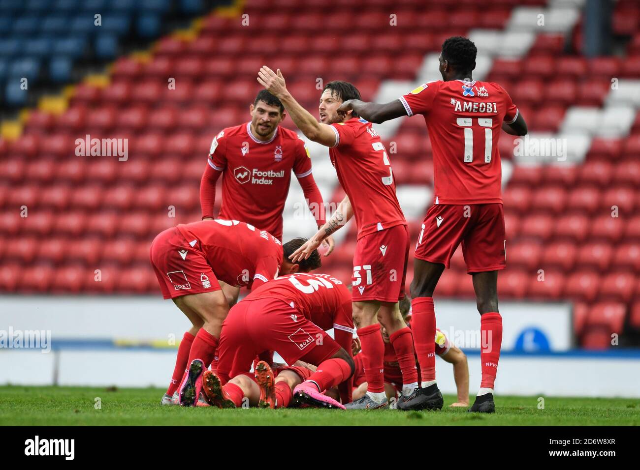 The Nottingham Forest players celebrate scoring a late goal to make the ...