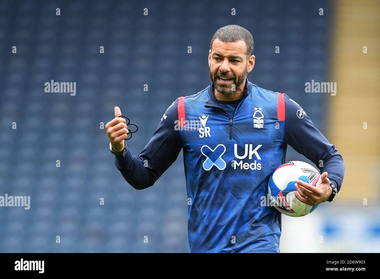 Steven Reid first team coach of Nottingham Forest leads the warm up ...