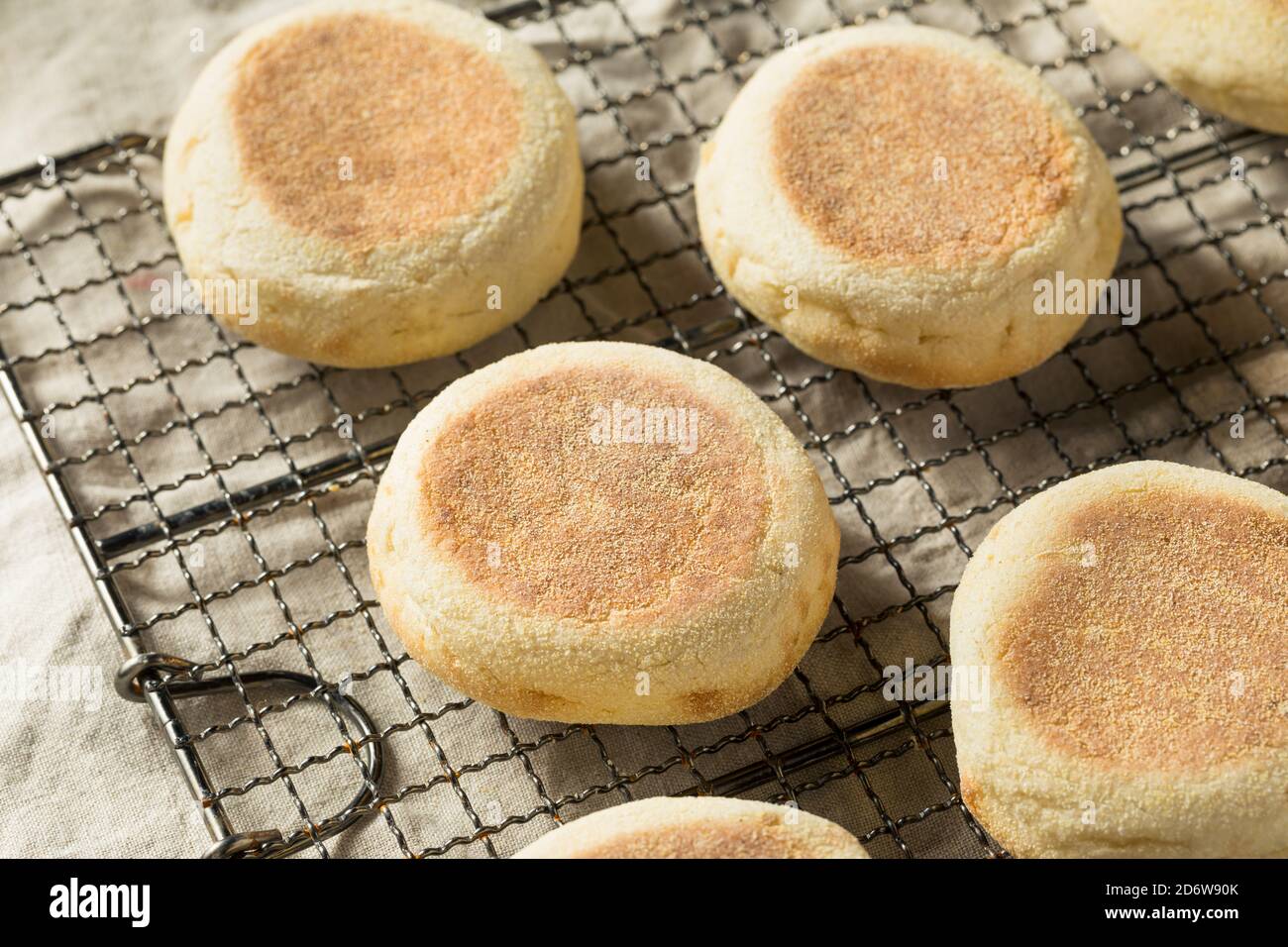 Homemade Toasted English Muffins with a Tab of Butter Stock Photo - Alamy
