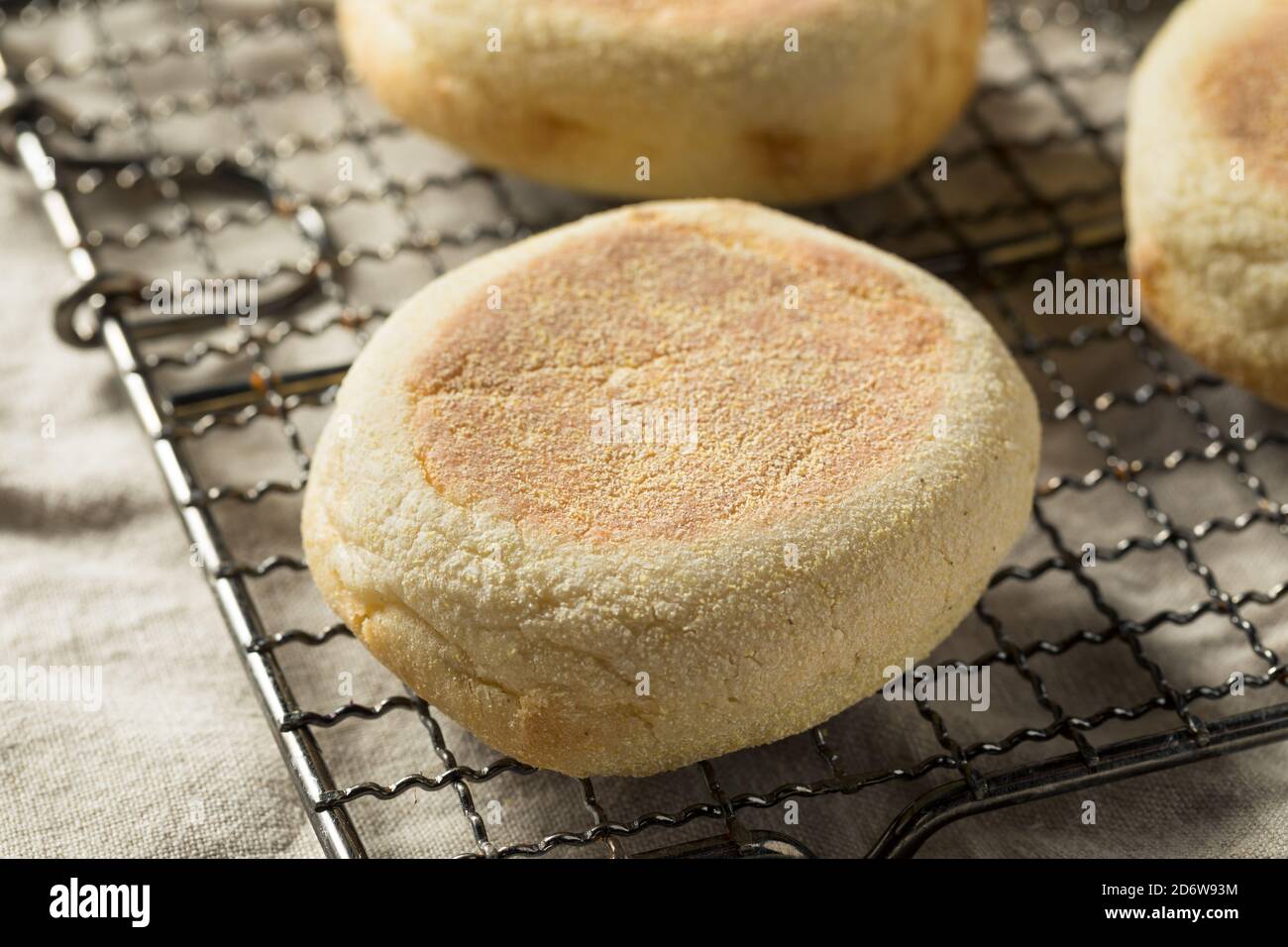 Homemade Toasted English Muffins with a Tab of Butter Stock Photo - Alamy
