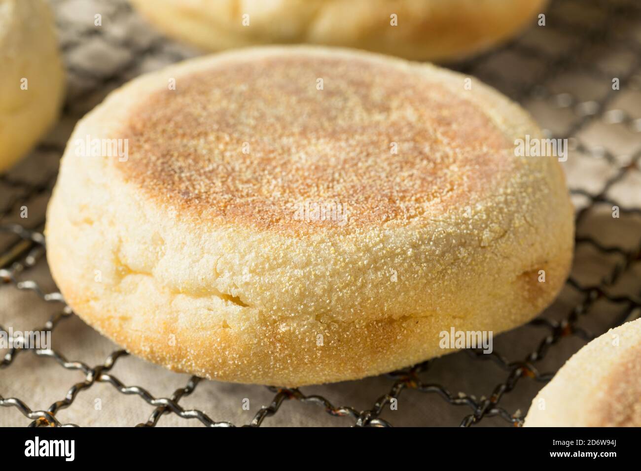 Homemade Toasted English Muffins with a Tab of Butter Stock Photo - Alamy
