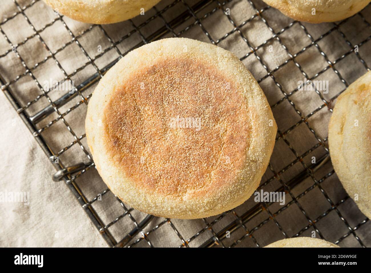 Homemade Toasted English Muffins with a Tab of Butter Stock Photo - Alamy