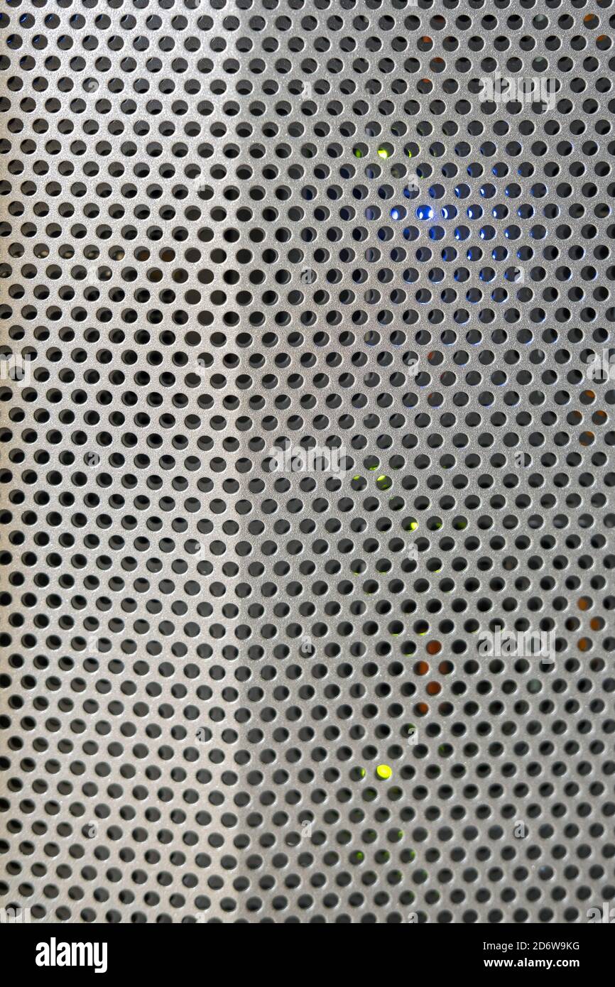 Background of a convex metal surface with round lattice holes Stock ...