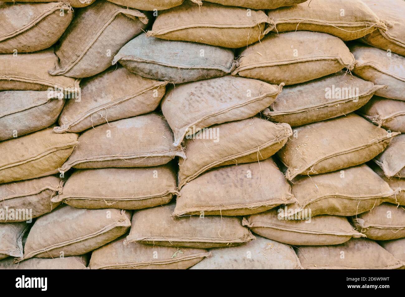 Background of lying dirty sandbags. Bags to strengthen the defensive ...