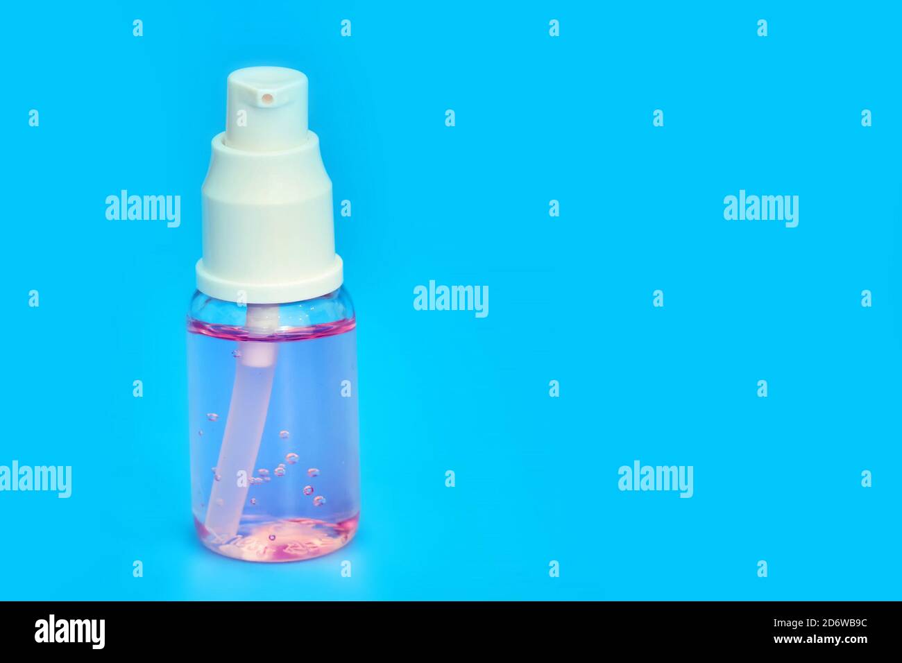 Medical hand hygiene product on blue background, copy space for text ...