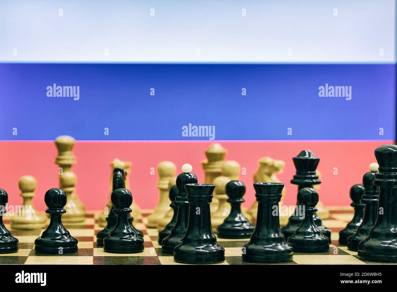 Russia flag on the background of chess with pieces on the Board Stock ...