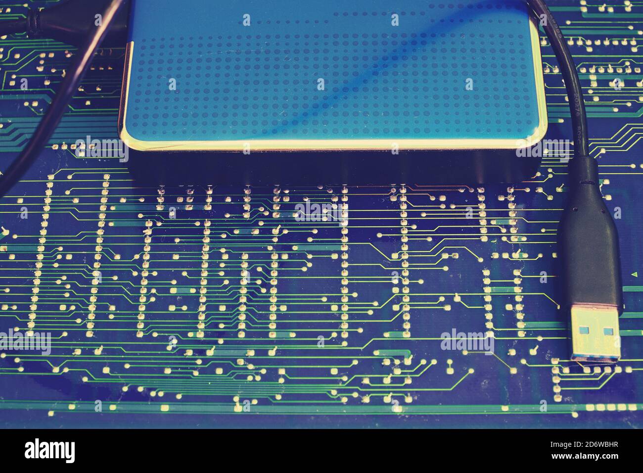 Portable hard disk on the background of the circuit board Stock Photo ...