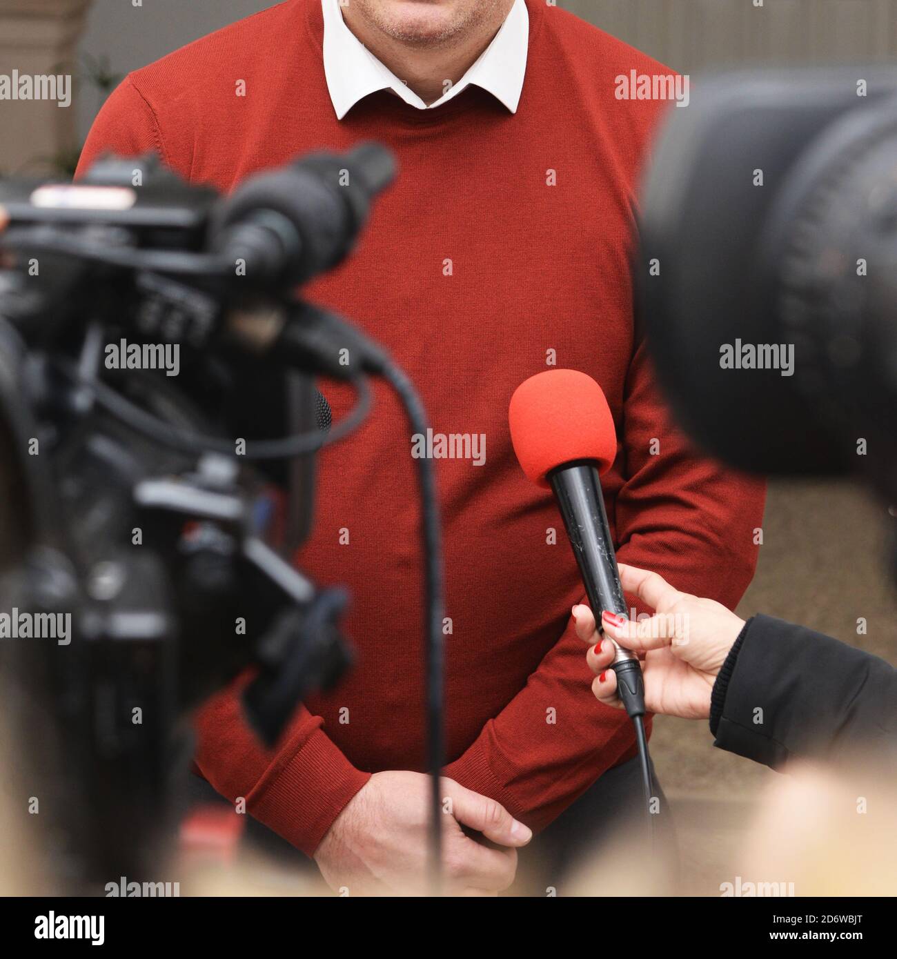 Close up of conference meeting microphones and businessman interview ...