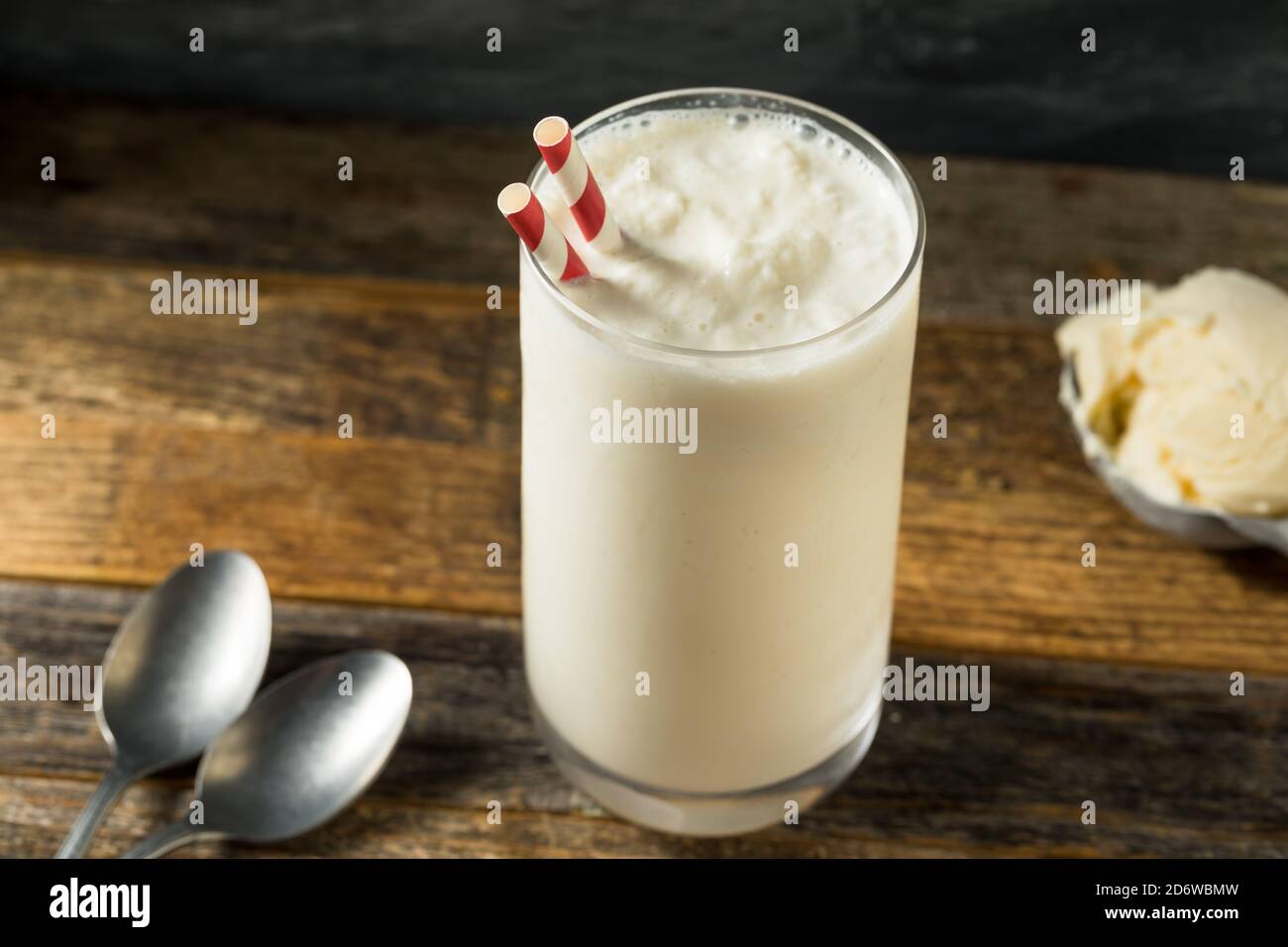 Homemade Frozen Vanilla Milkshake with a Straw Stock Photo - Alamy