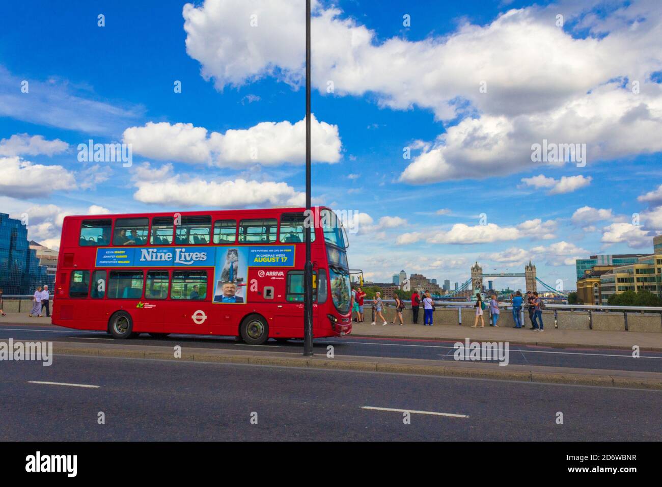 Traditional red bus at London Bridge,concrete pedestrian and traffic ...