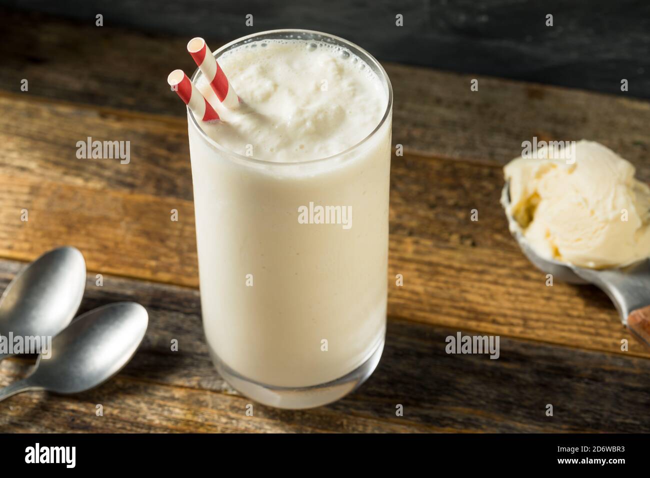 Homemade Frozen Vanilla Milkshake with a Straw Stock Photo - Alamy