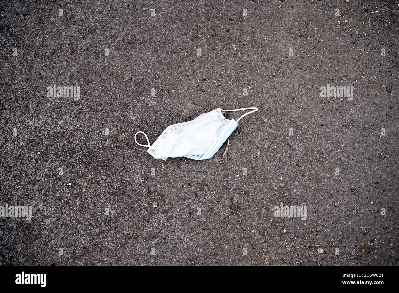 Discarded disposable PPE face mask Stock Photo - Alamy