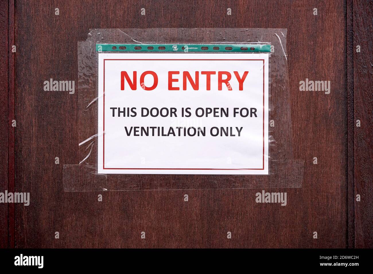 No entry sign taped to a door Stock Photo - Alamy
