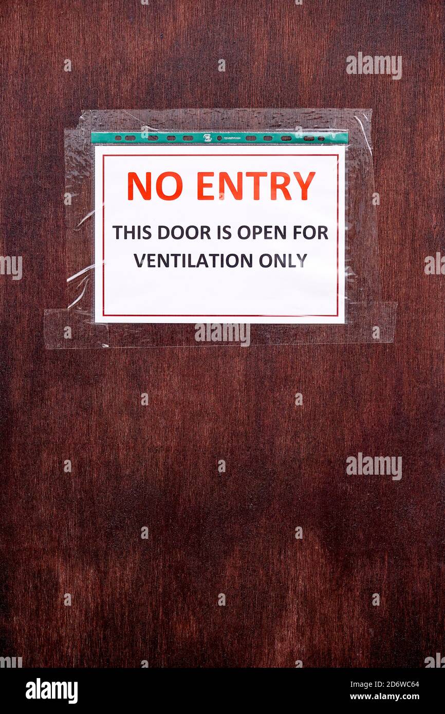 No entry sign taped to a door Stock Photo - Alamy