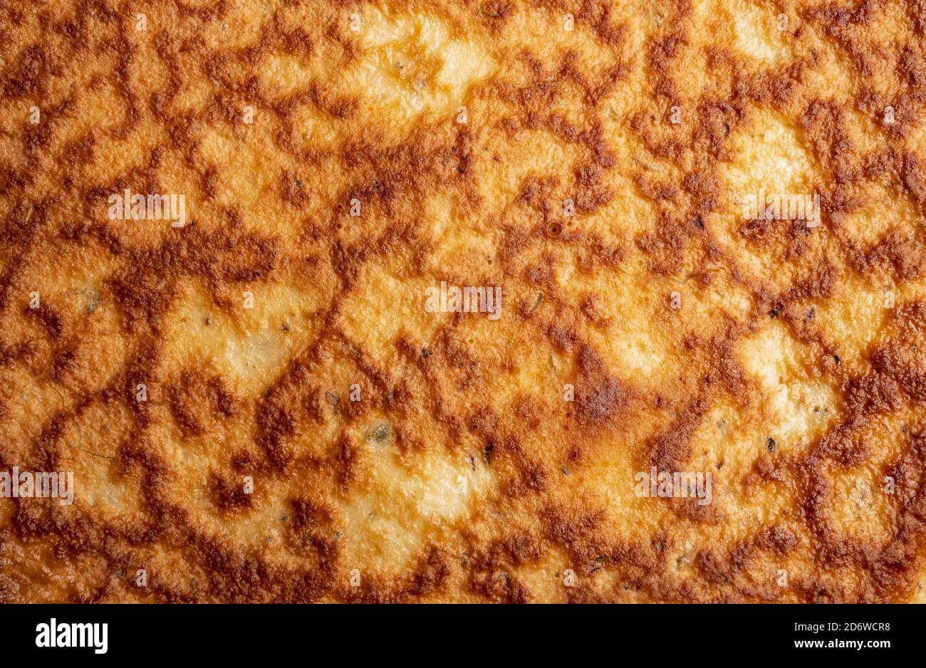 Omelette, frittata texture or Spanish tortilla, top view. Close up of ...