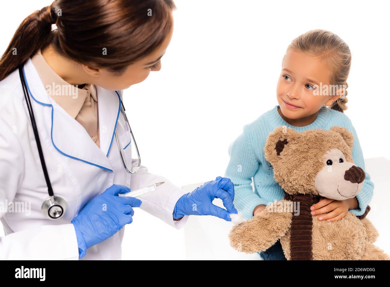 Selective focus of pediatrician in latex gloves holding cotton and ...