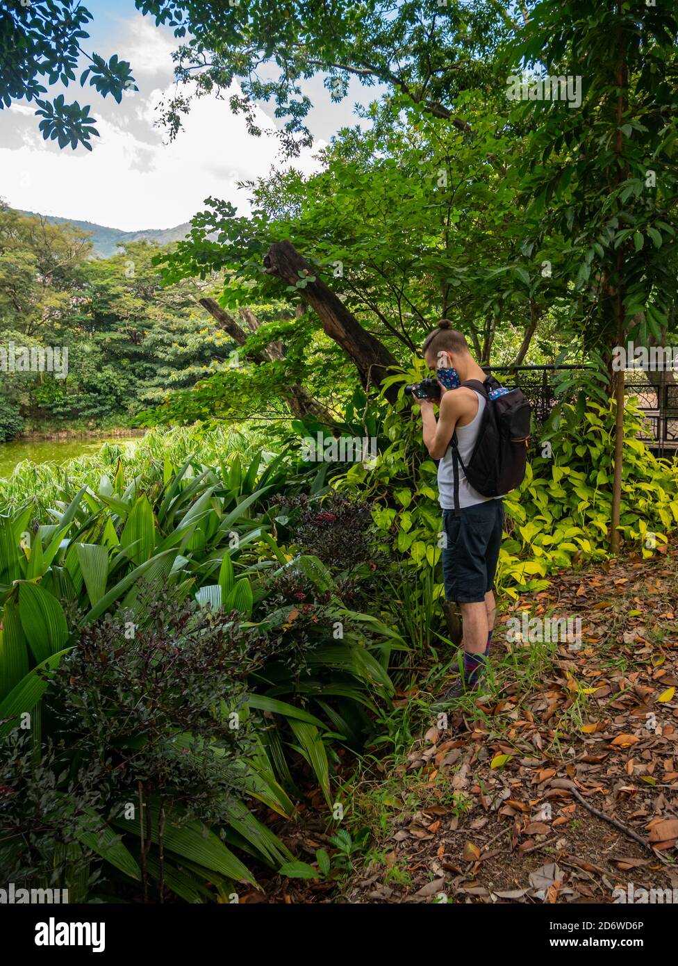 Caucasian Blond Man Wearing a Handcraft Face Mask Stock Photo - Alamy
