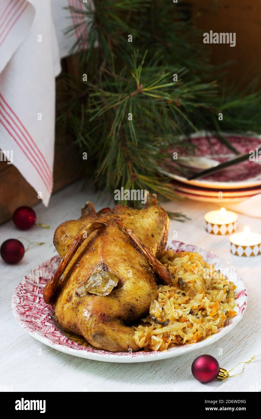Baked duck with cabbage in a festive decoration. Rustic style Stock ...