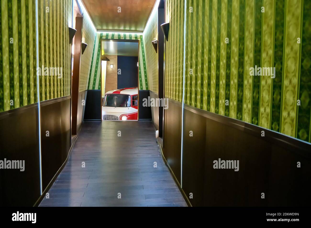 Car in the room of an apartment building, minivan Stock Photo - Alamy