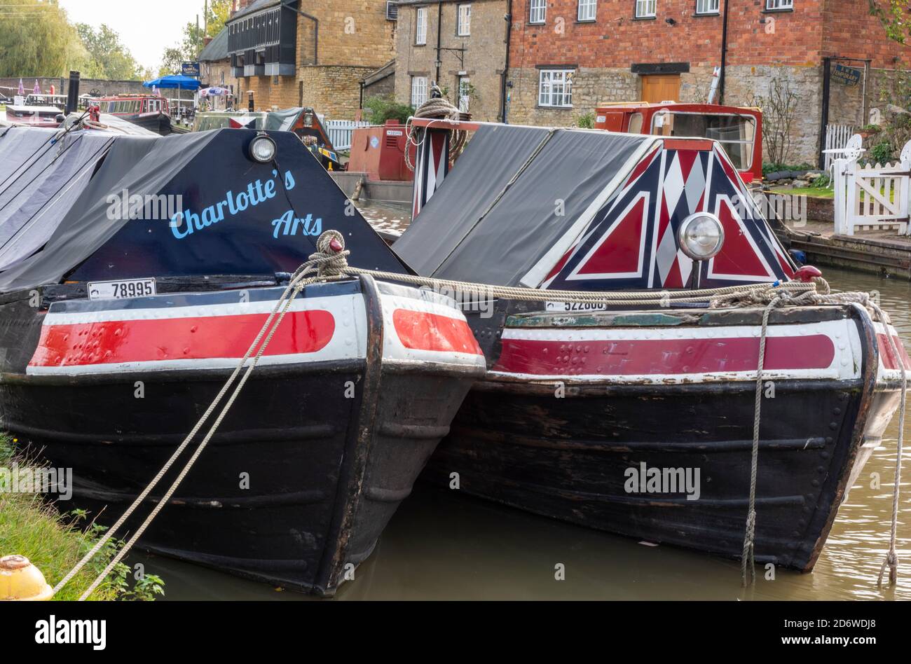traditional working narrow boats alongside at the wharf at stoke ...
