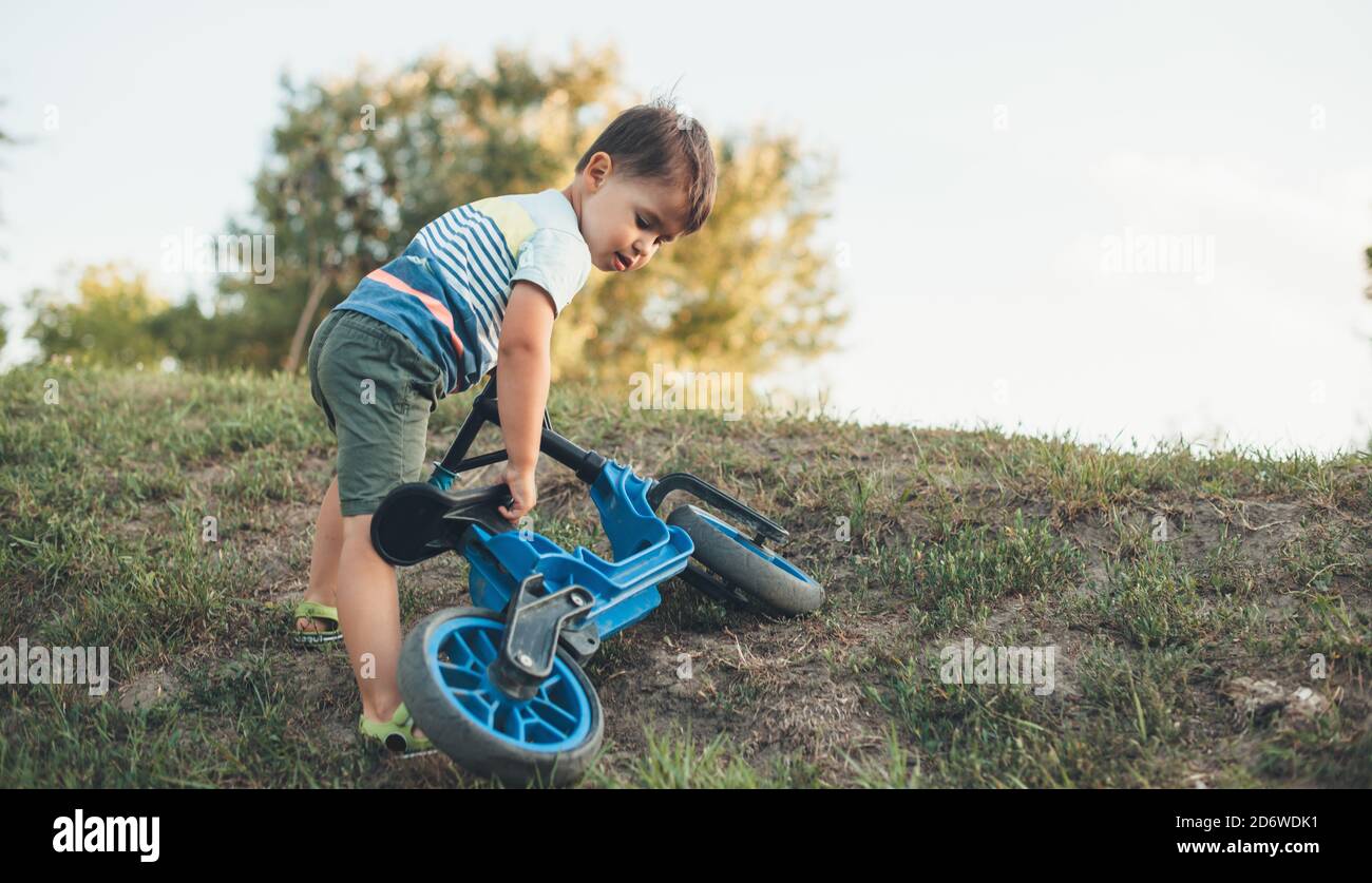 Boy push bike day hi-res stock photography and images - Alamy