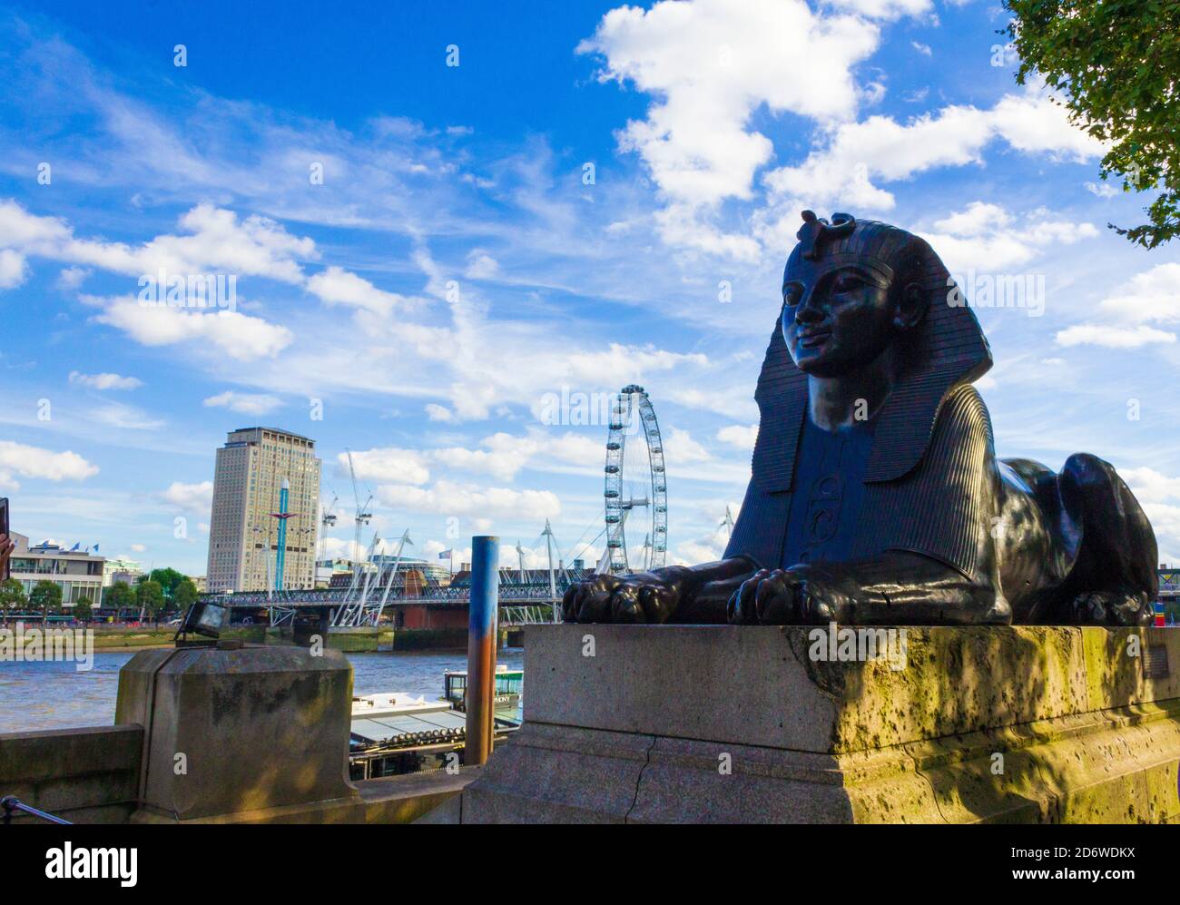 A bronze Sphinx next to Cleopatra`s Needle, Victoria Embankment London ...