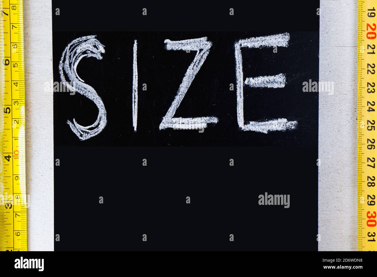 Tape measure, centimeters and millimeters on the yellow ruler and size ...