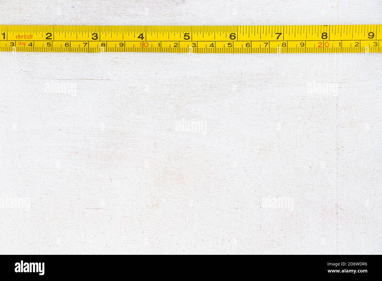 Metal ruler, centimeters and millimeters on the yellow ruler. Sizes on ...