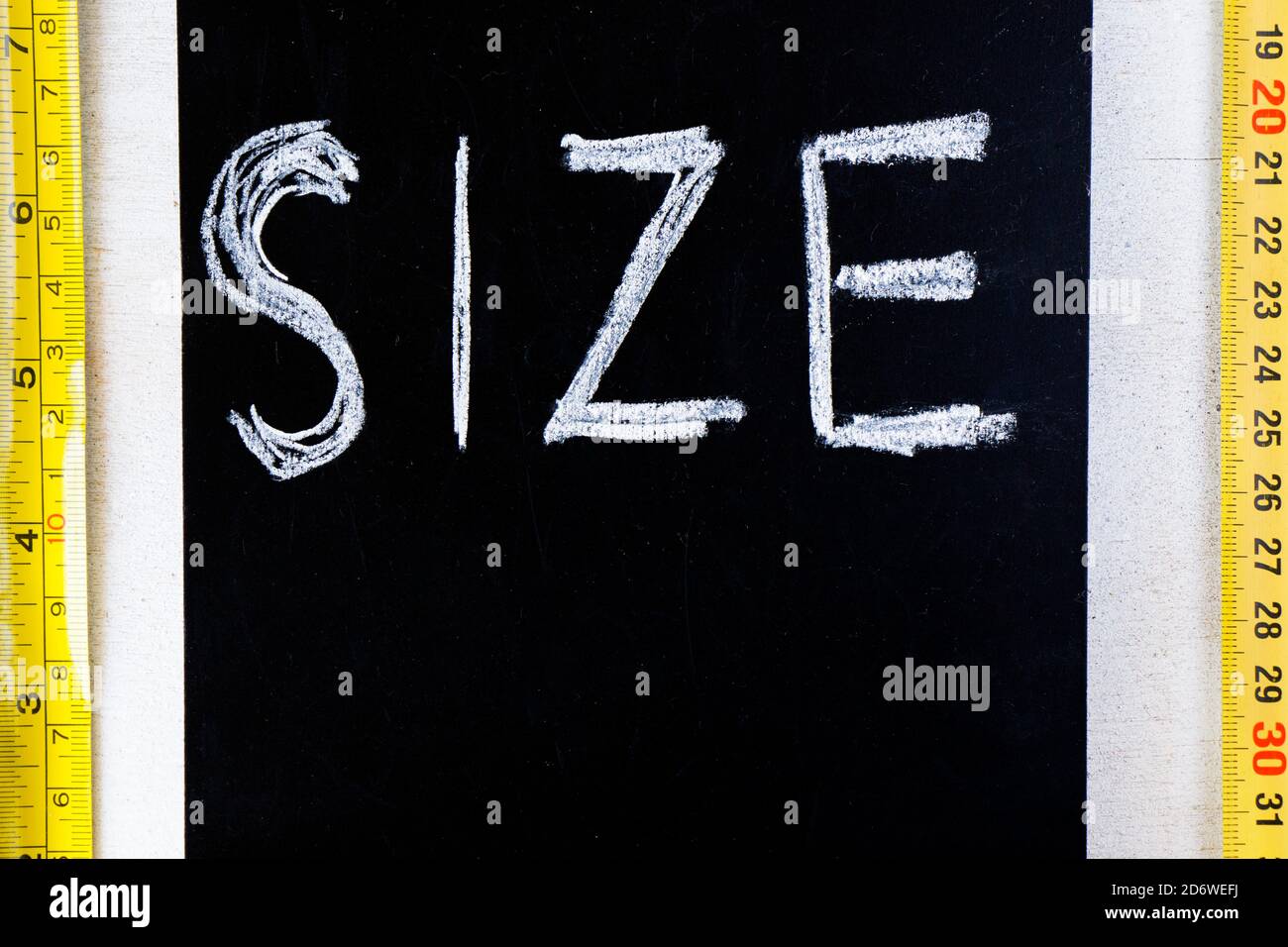 Tape measure, centimeters and millimeters on the yellow ruler and size ...