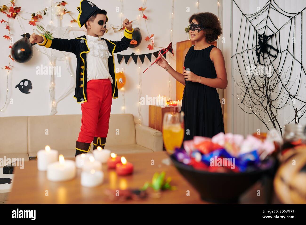 Boy in pirate Halloween costume dancing Stock Photo - Alamy
