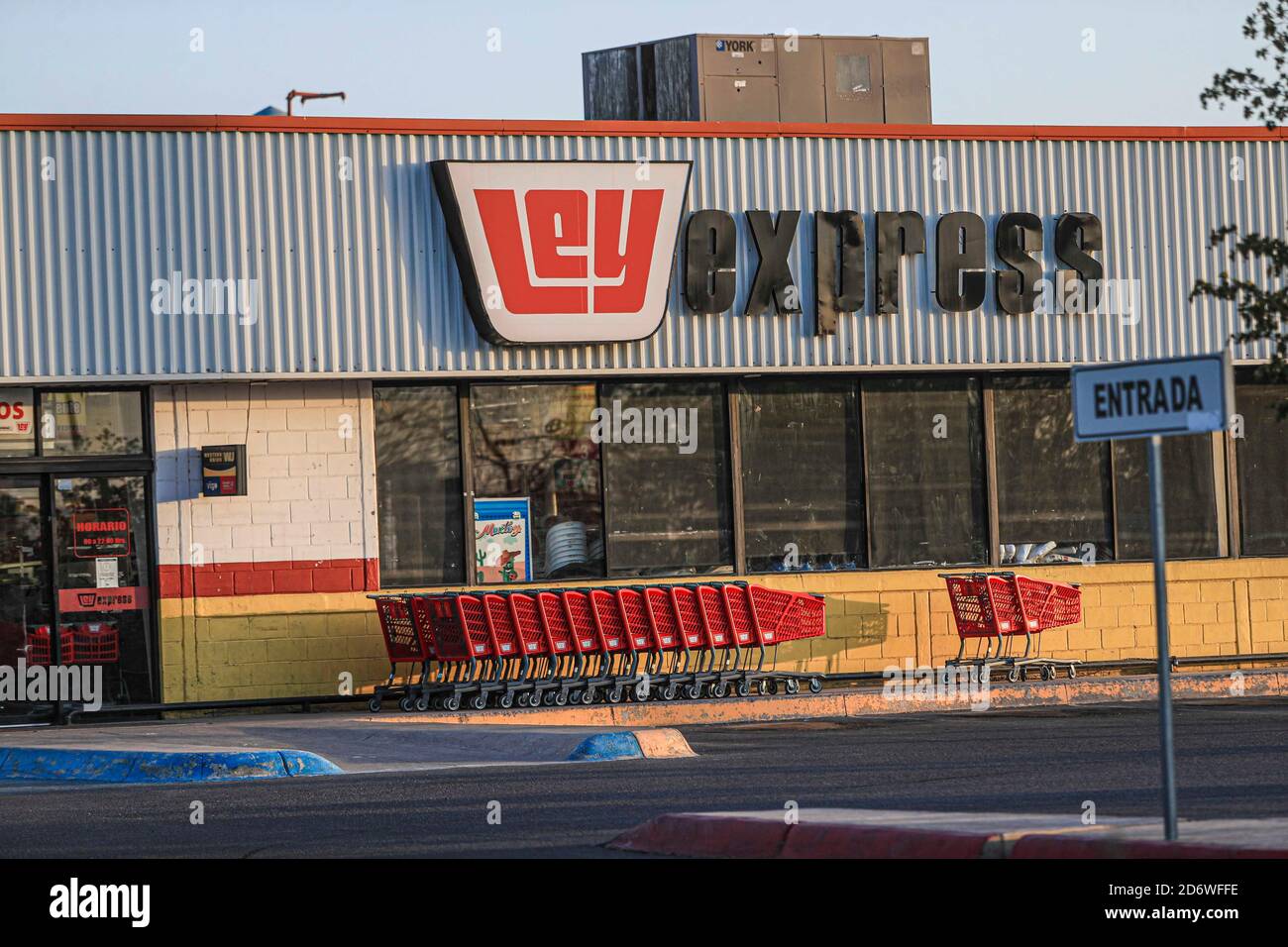 Facade of Ley Express stores in Hermosillo. self service carts ...