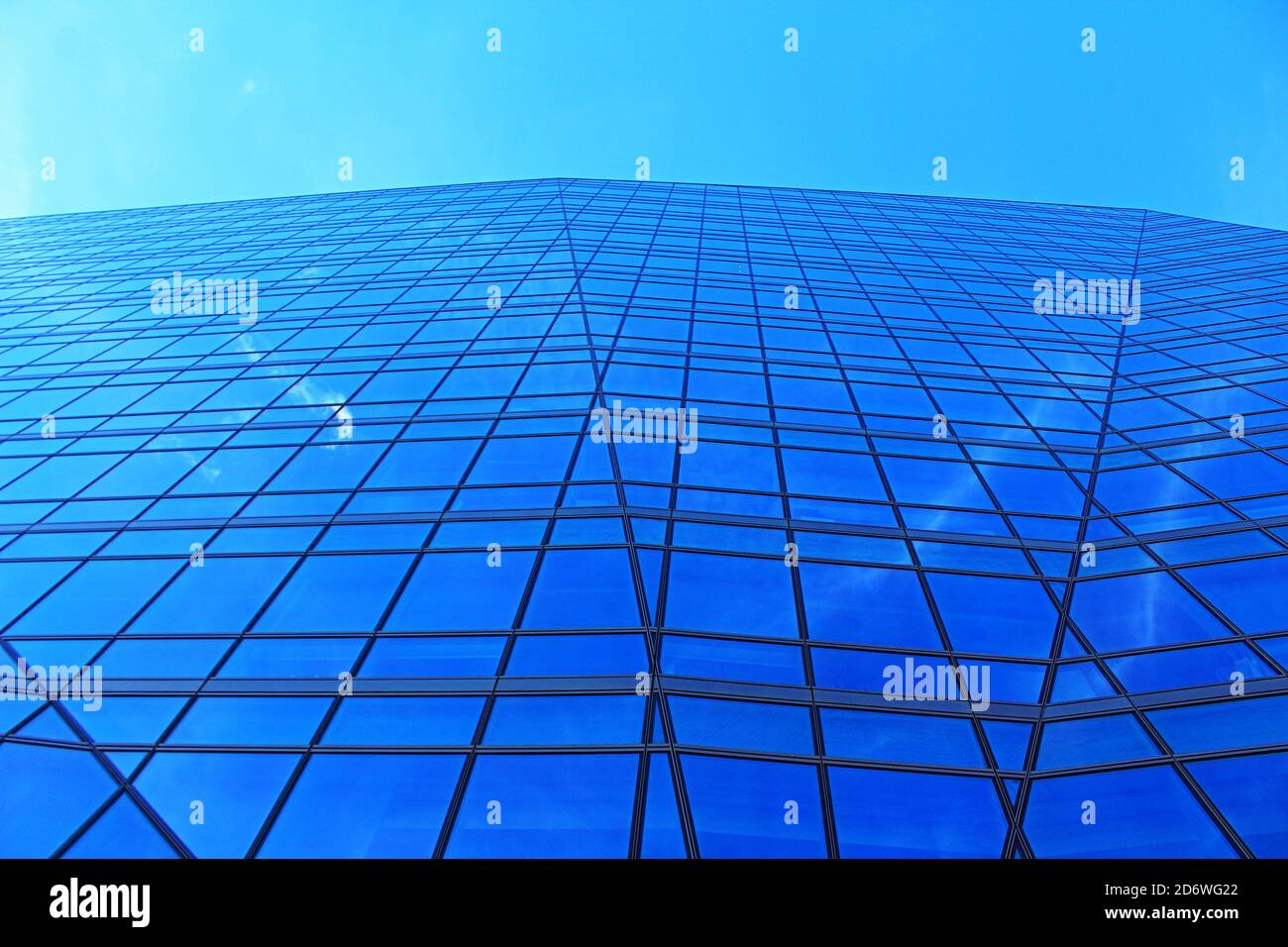 Modern business buildings glass facades against nice blue sky in ...