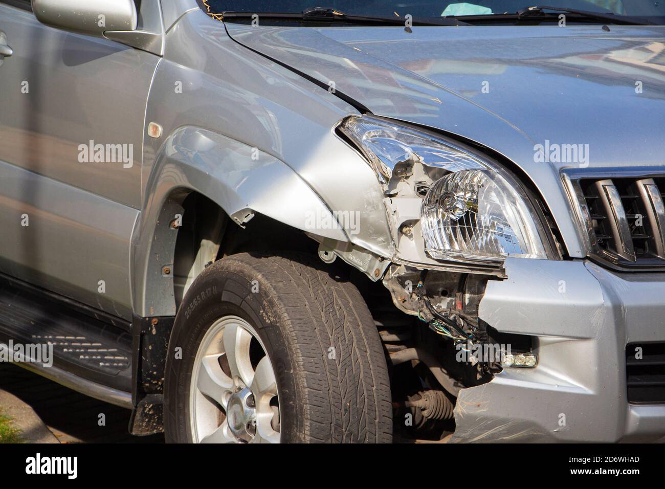 car with a broken headlight, after the accident Stock Photo - Alamy