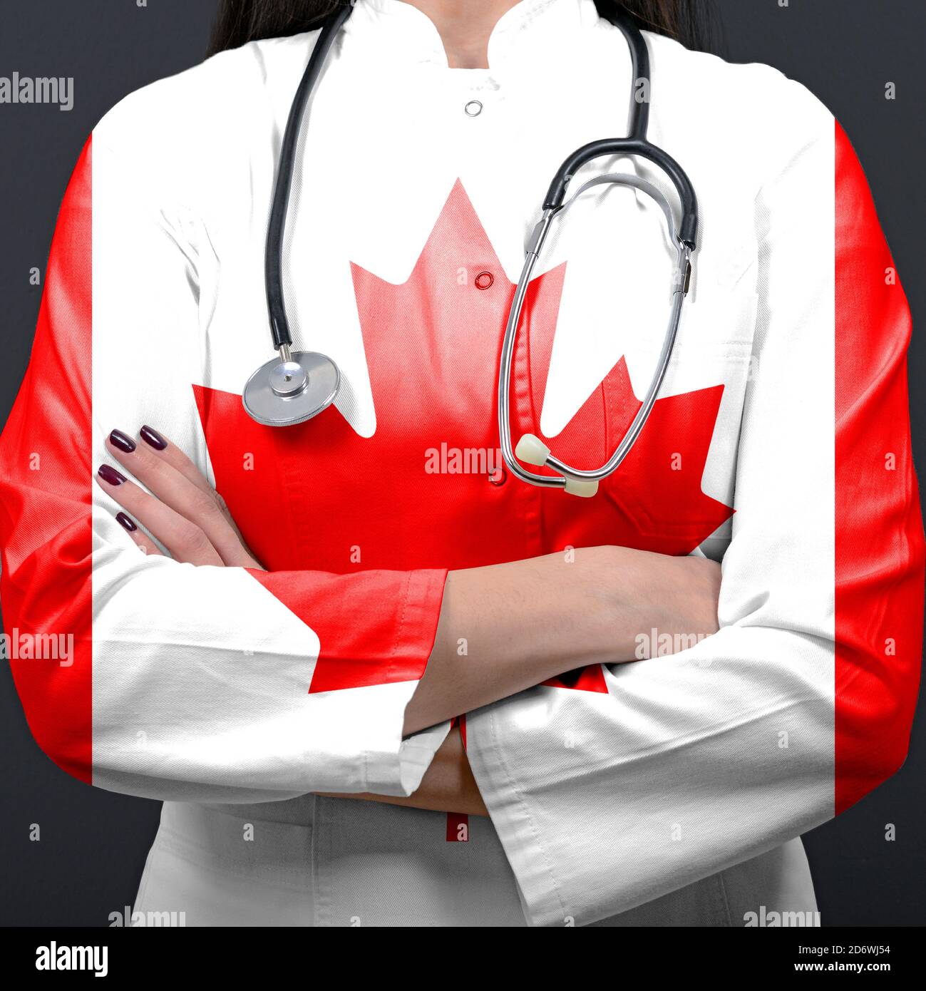 Doctor representing healthcare system with National flag of Canada ...