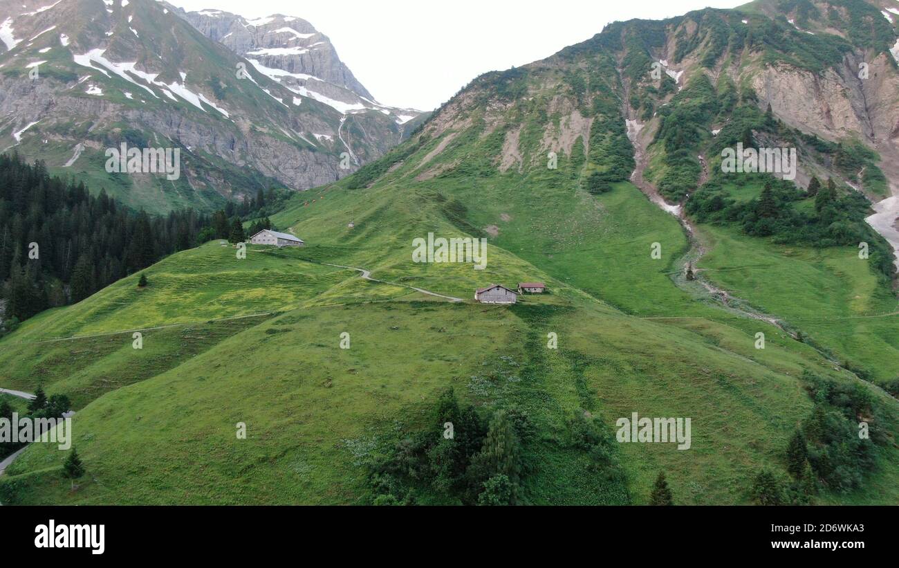 Farm houses in the mountains in Austria Stock Photo - Alamy